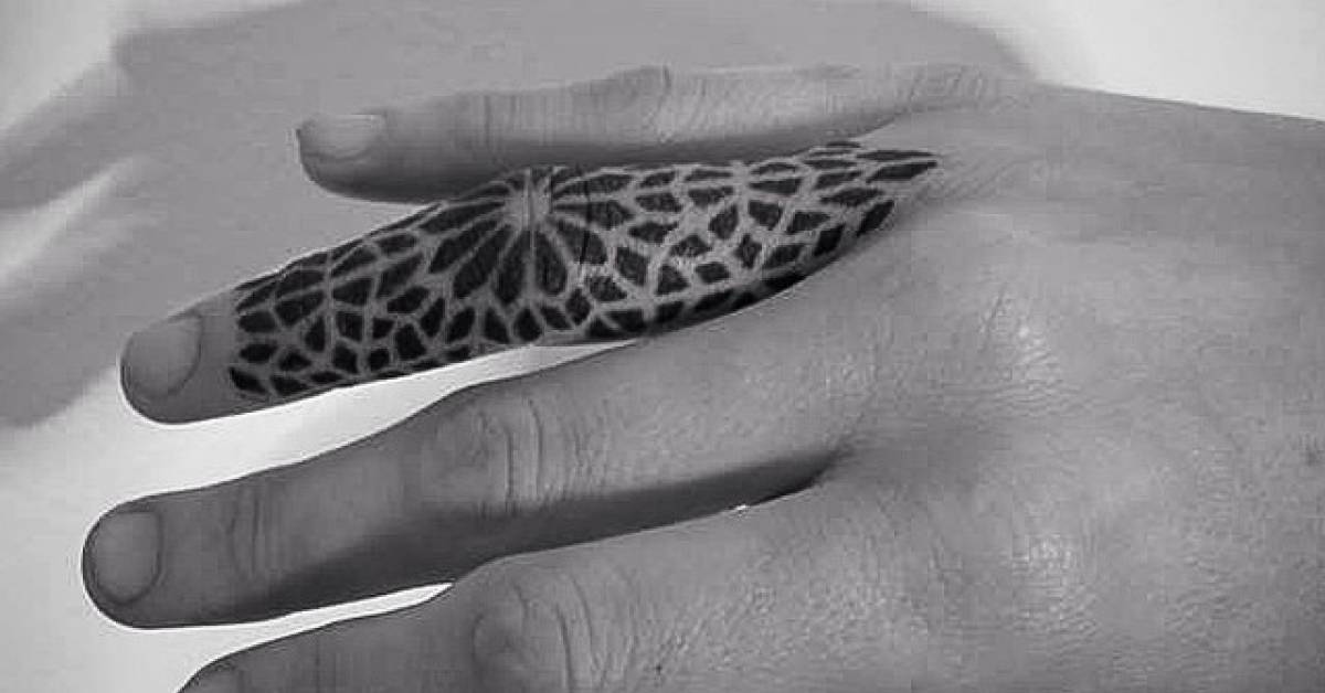 Finger mandala tattoo.