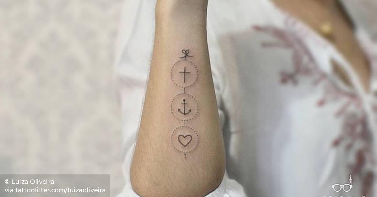Small cross, anchor and heart tattoo on the right