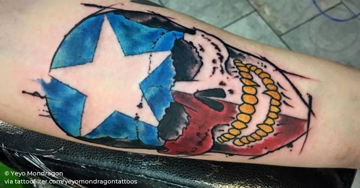 Stone cold skull with the Texas flag and a gold grill I