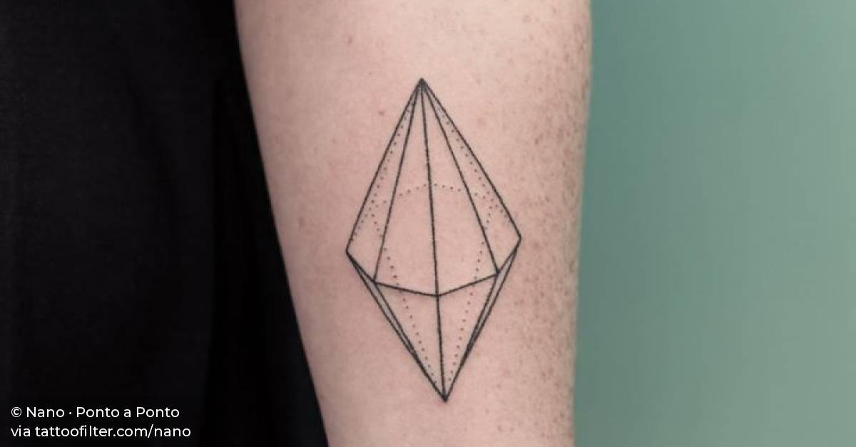 Hand poked octagonal bipyramid tattoo on the left
