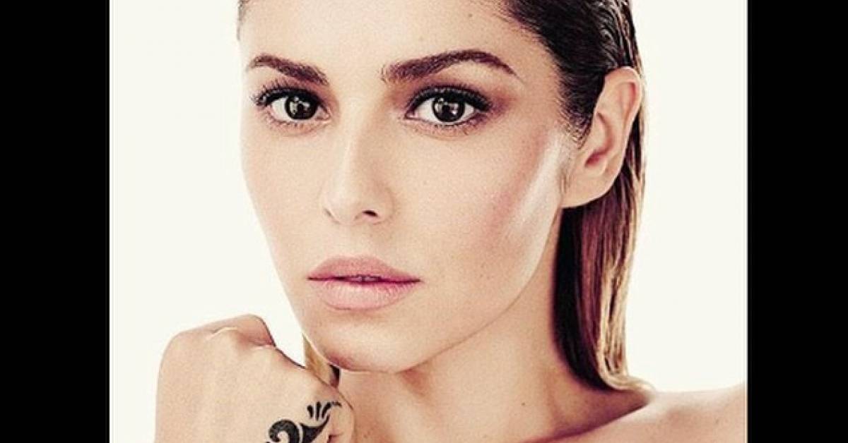 Small tribal on Cheryl's hand.