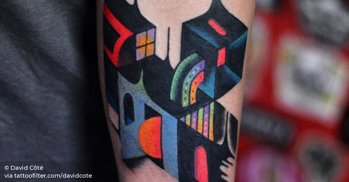 'Acidchitecture' tattoo on the left inner forearm.