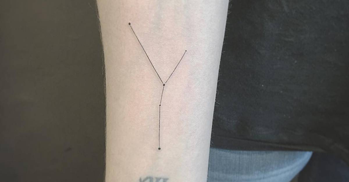 Fine line style Cancer constellation tattoo on the