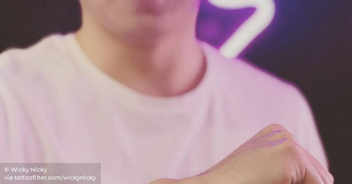 Inguz tattoo on the wrist.