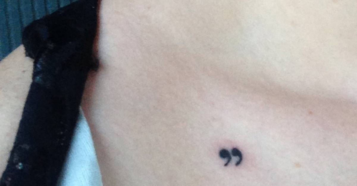 Collarbone quotation marks on Misha.