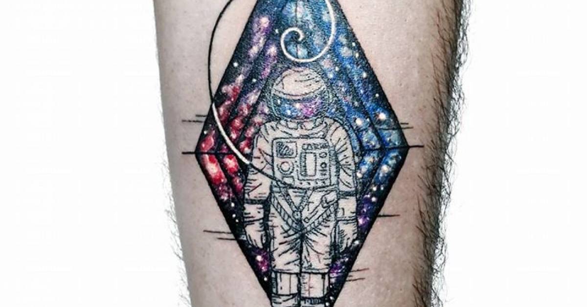 Psychedelic astronaut tattoo on the left inner forearm.