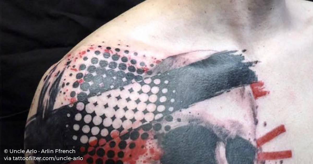 Graphic skull tattoo on the right side chest and