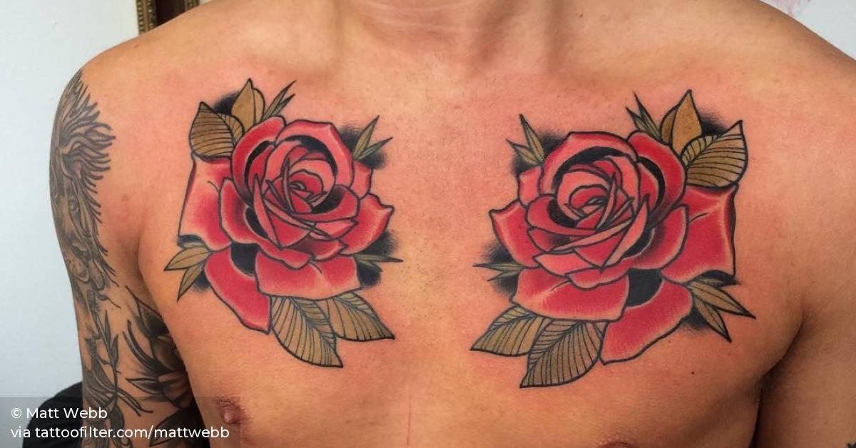 Matching red rose tattoos on the chest.