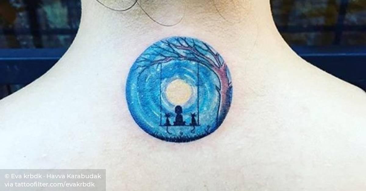 Small illustrative circle tattoo of a swing on the