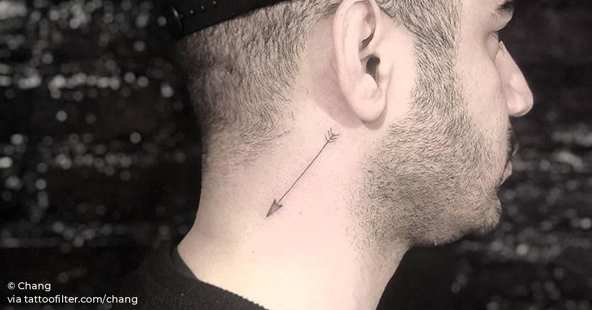 Arrow tattoo on the right side of the neck.