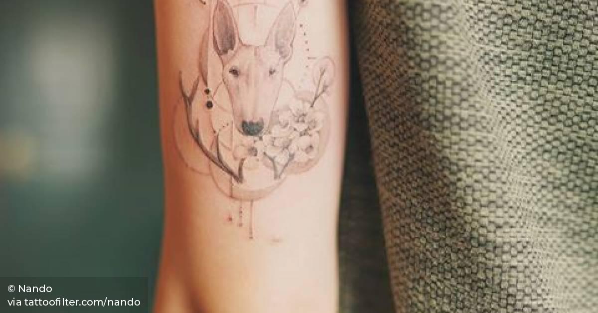 Fine line bull terrier tattoo on the left back of the