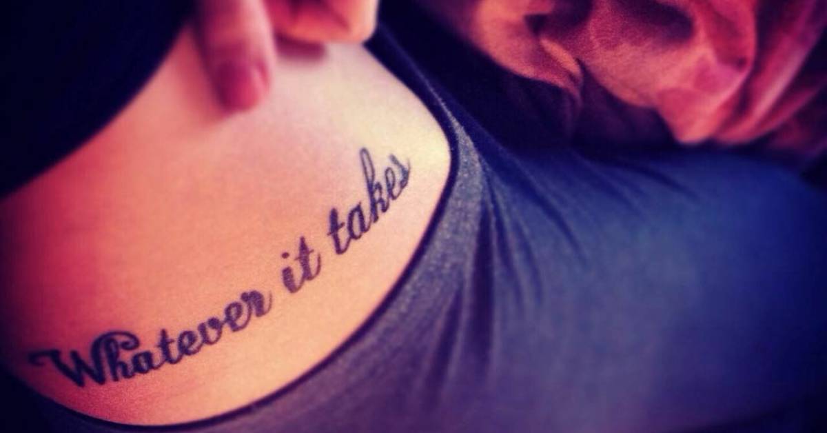 Side tattoo saying "Whatever it takes" on Nicole.