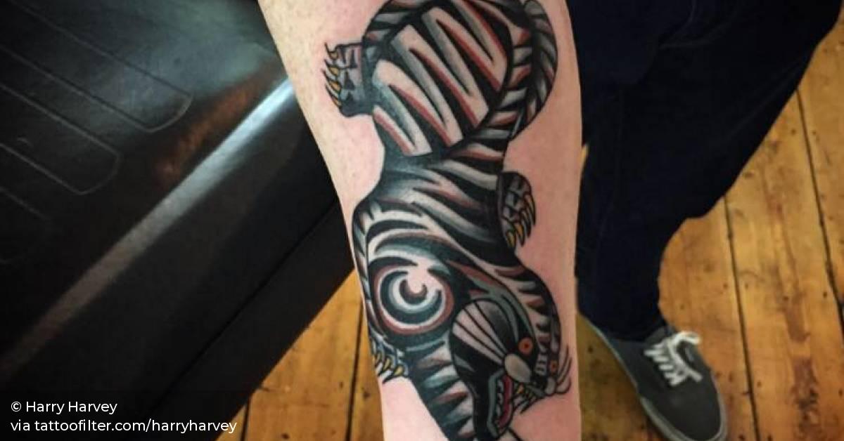 Traditional style tiger tattoo on the right inner