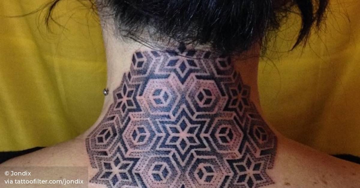 Dotwork mandala tattoo on the back of the neck.