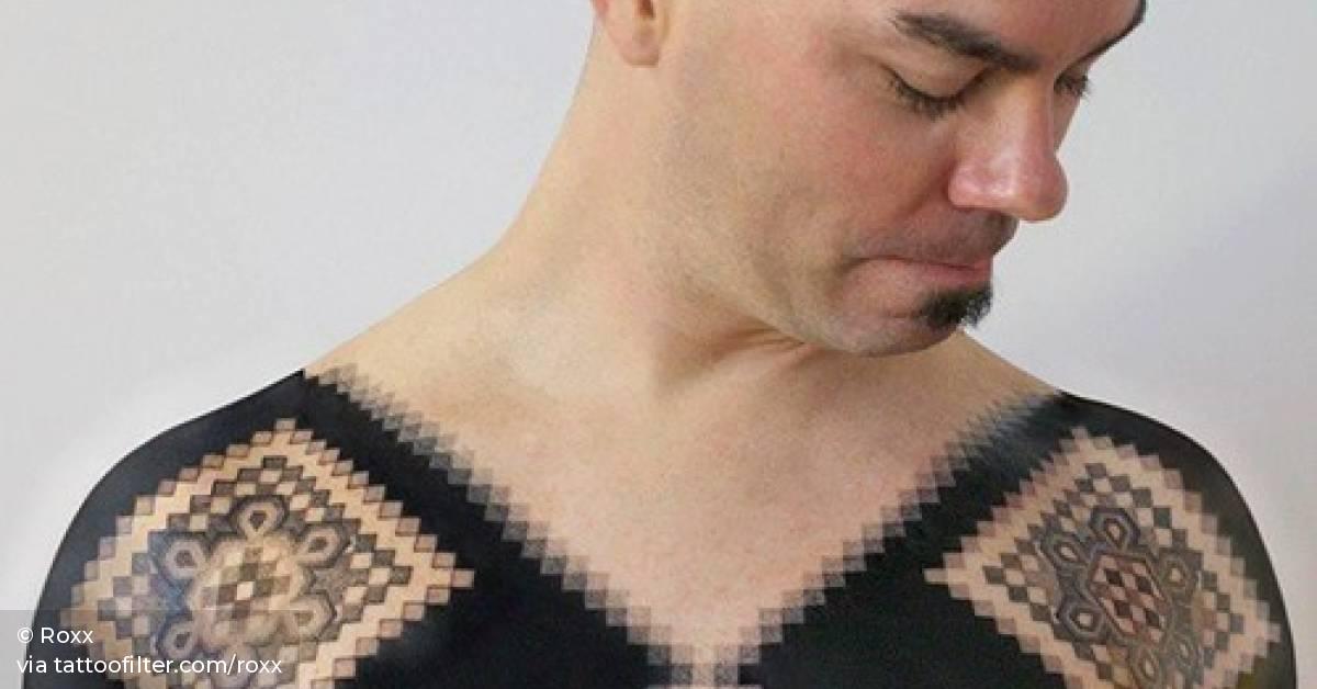 Blackwork tattoo creating an optical illusion.