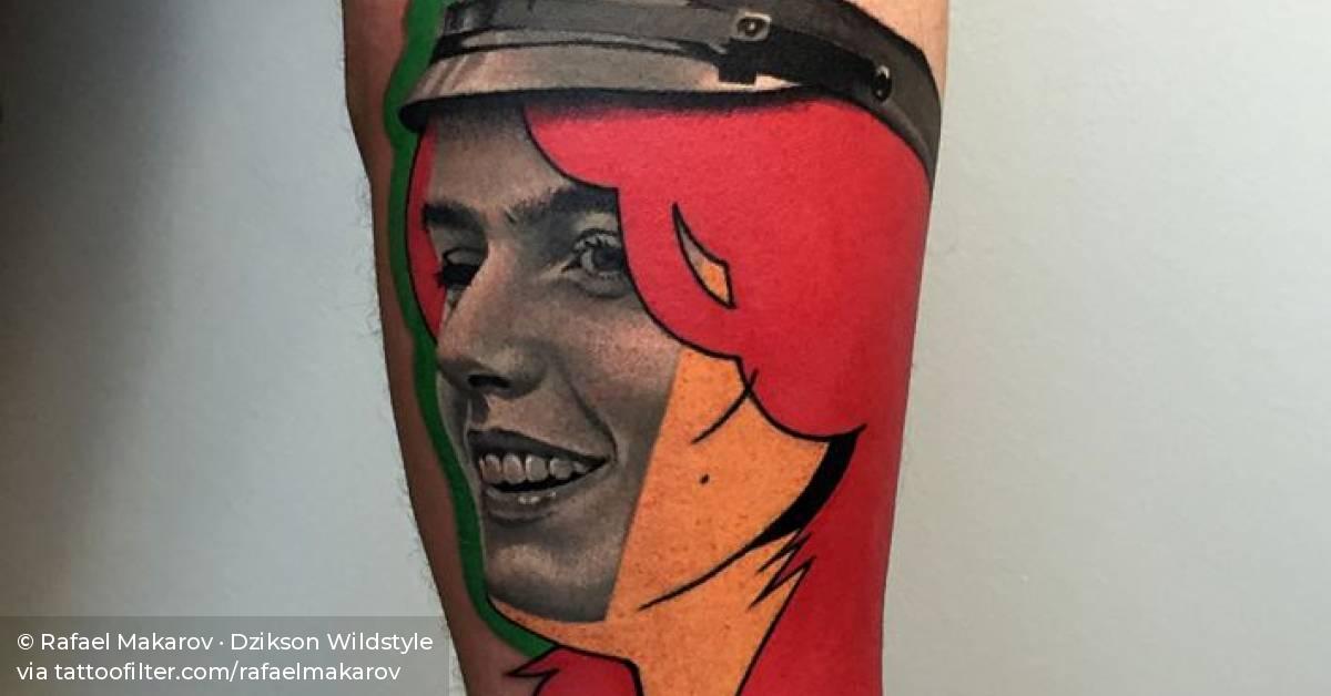 Mum's portrait tattoo on the forearm.