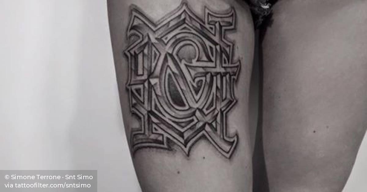 Lettering tattoo on the right thigh.