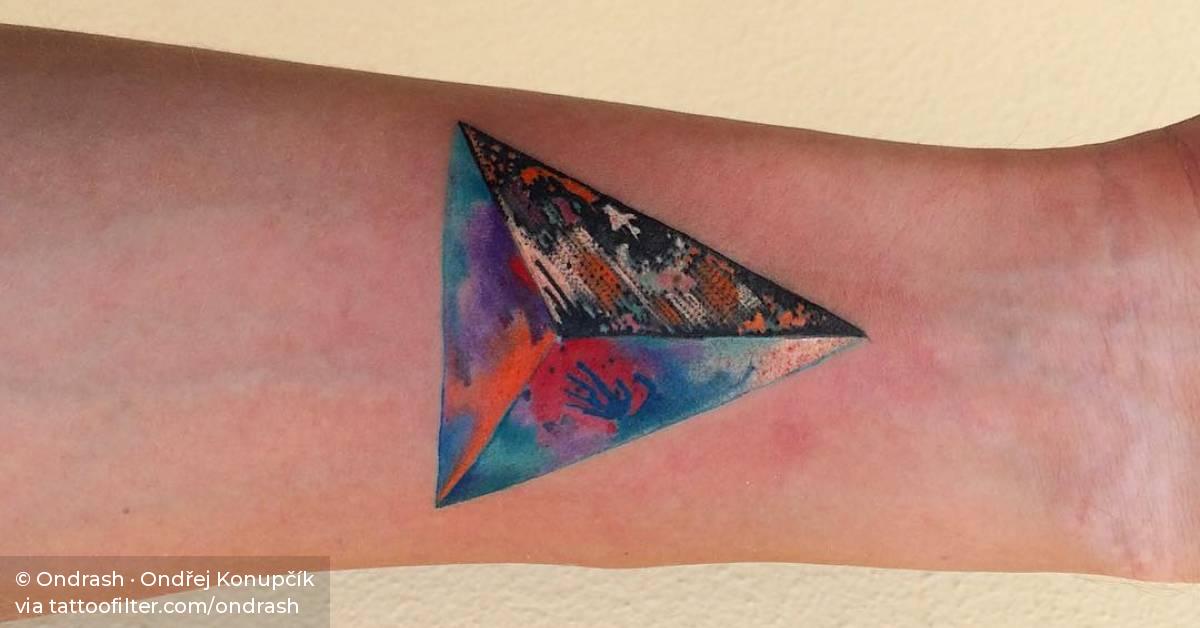 Abstract triangle tattoo on the forearm.
