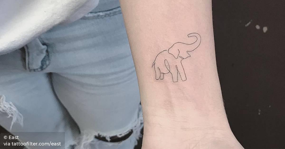 Continuous line elephant tattoo.