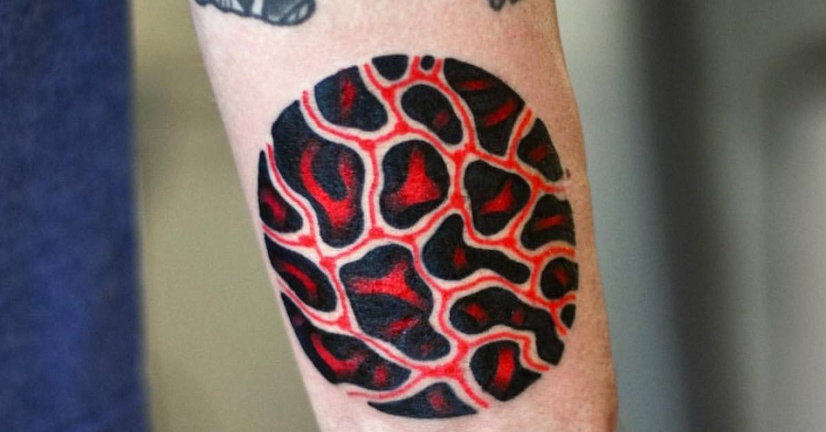 Parasite tattoo on the inner wrist.