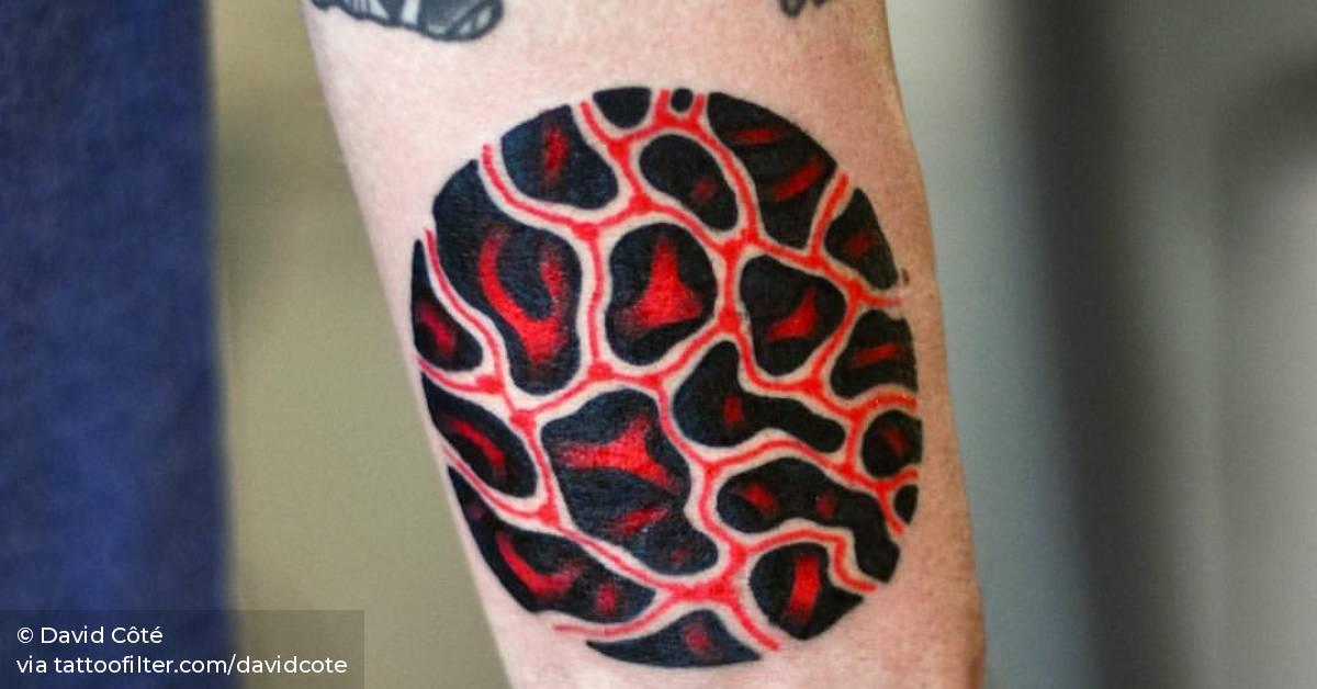 Parasite tattoo on the inner wrist.