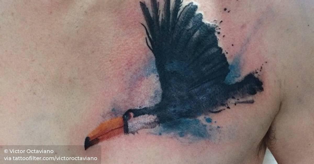 Watercolor style toucan on the chest.