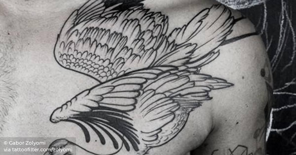 Crane tattoo on the left side chest and shoulder.