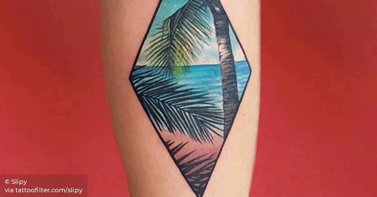 Beach landscape rhombus tattoo on the left inner