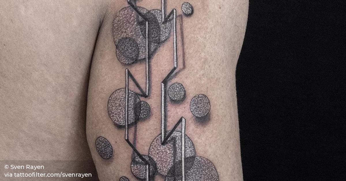 Geometric optical illusion tattoo on the back of the