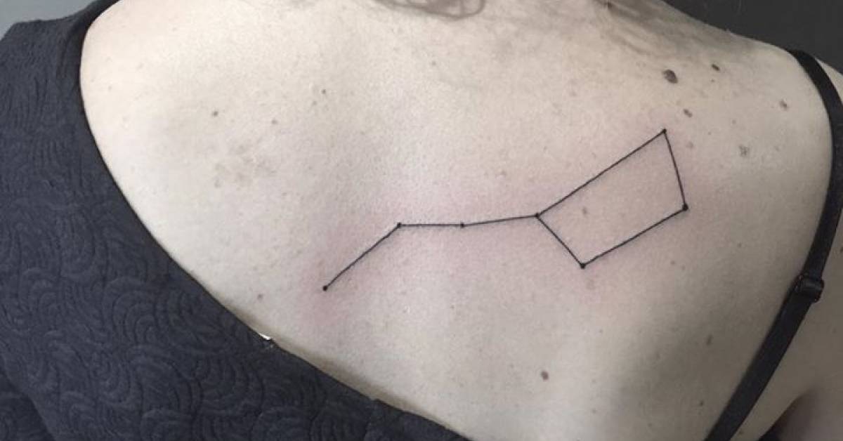 Big Dipper constellation tattoo on the upper back.