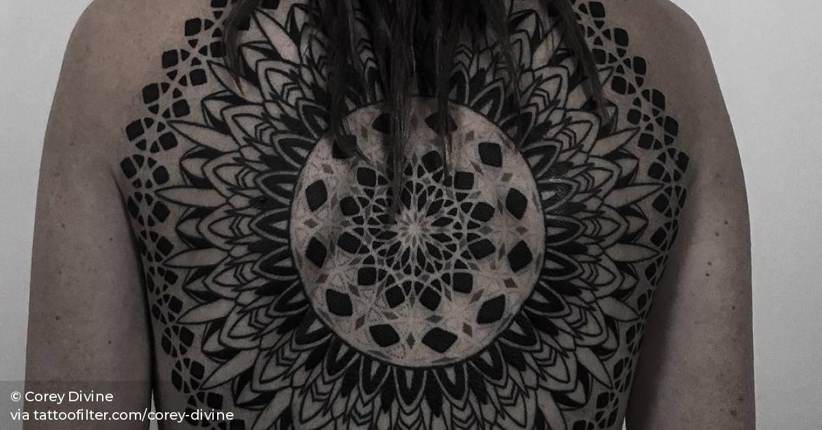 Mandala backpiece tattoo.
