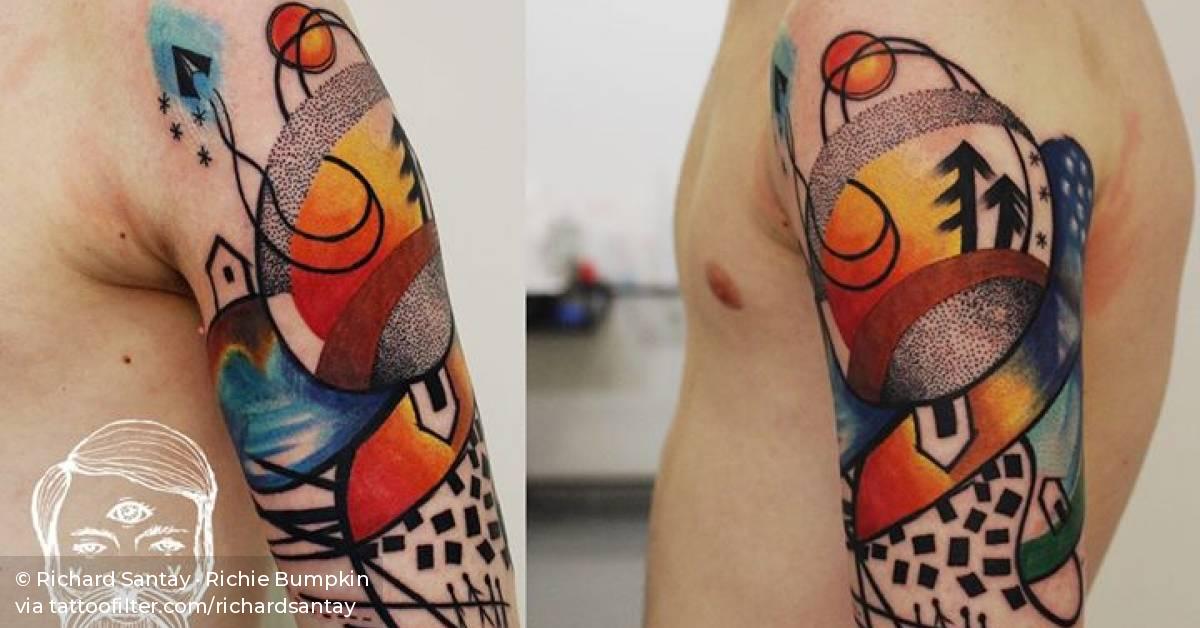Illustrative piece on the left upper arm. Design by
