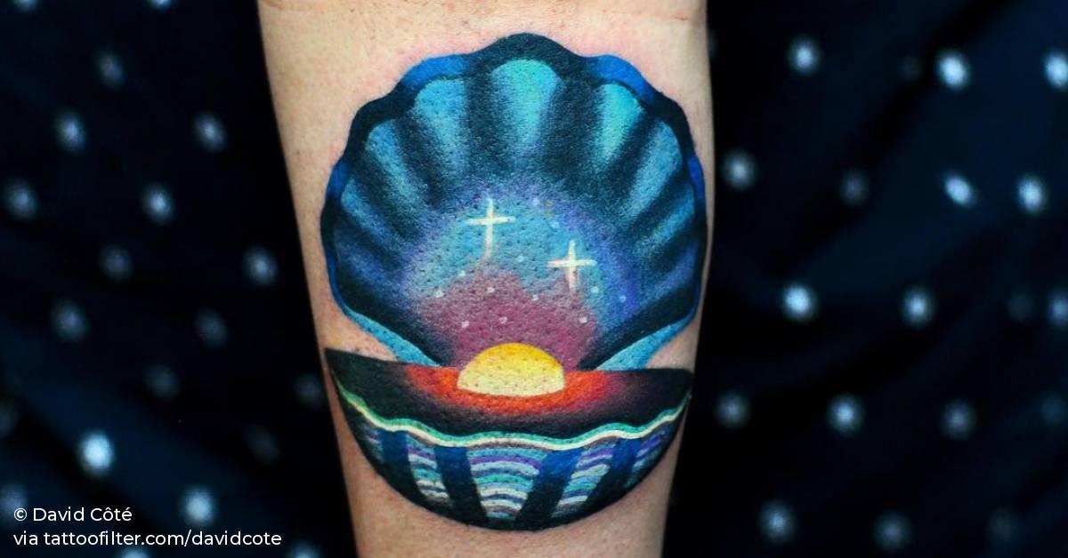 Pop art style open shell tattoo on the left forearm.
