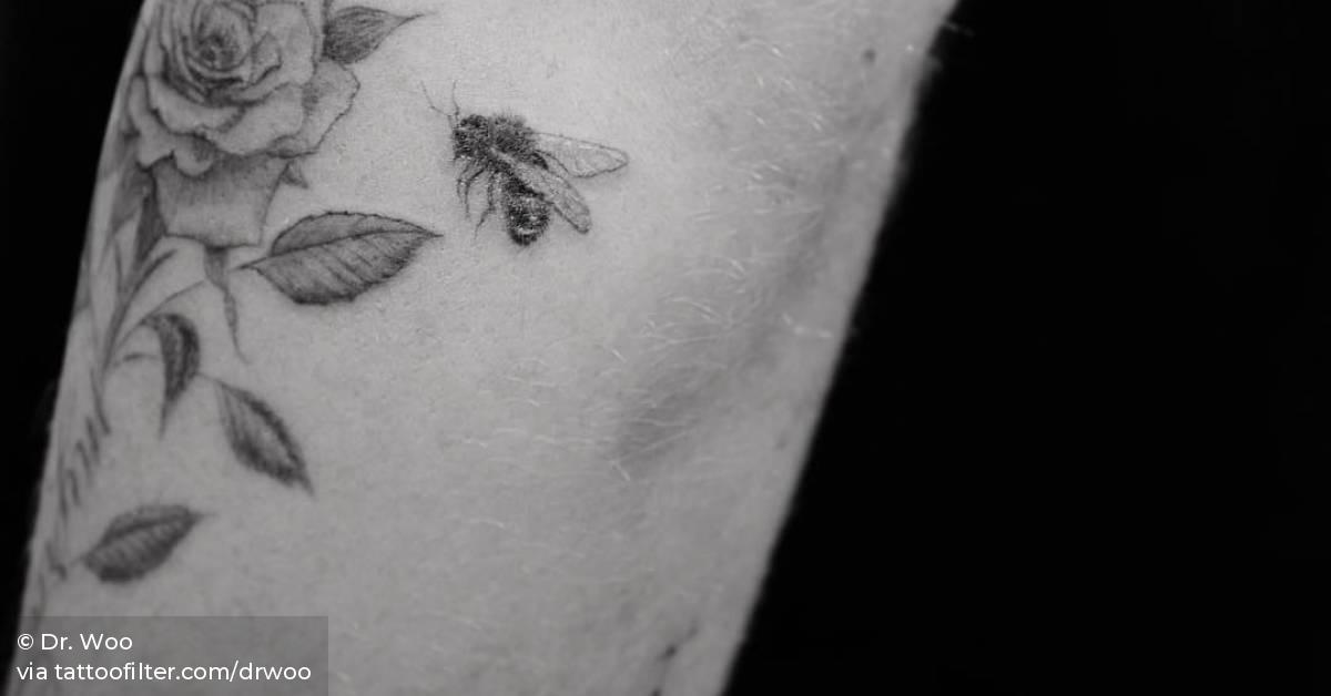 Single needle bee tattoo on Manager Myles.