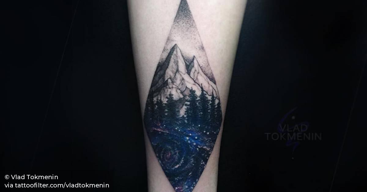 Landscape rhombus tattoo on the inner forearm.