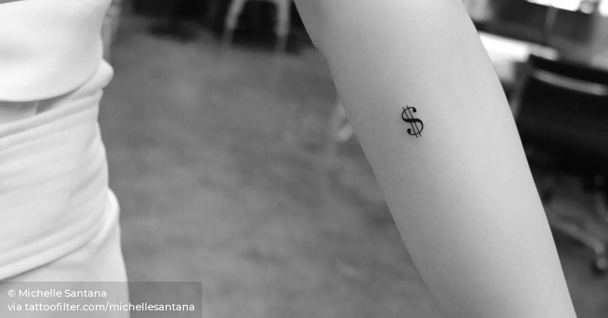$ Dollar sign tattoo on Becky G's left inner forearm.