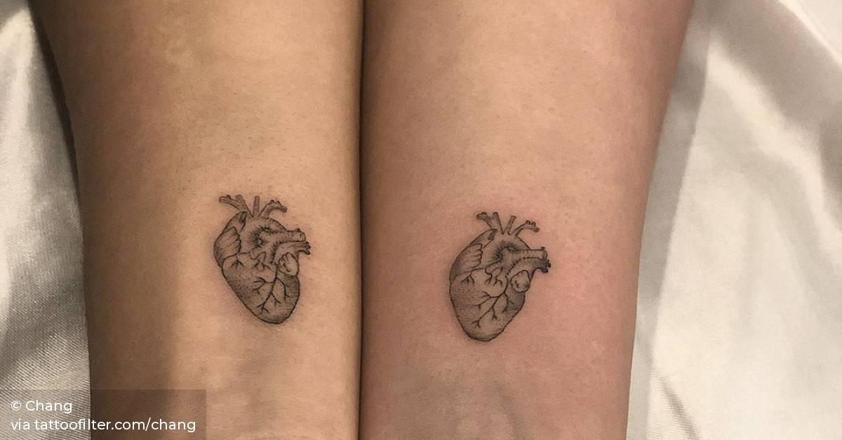 Matching hearts on mother and daughter.