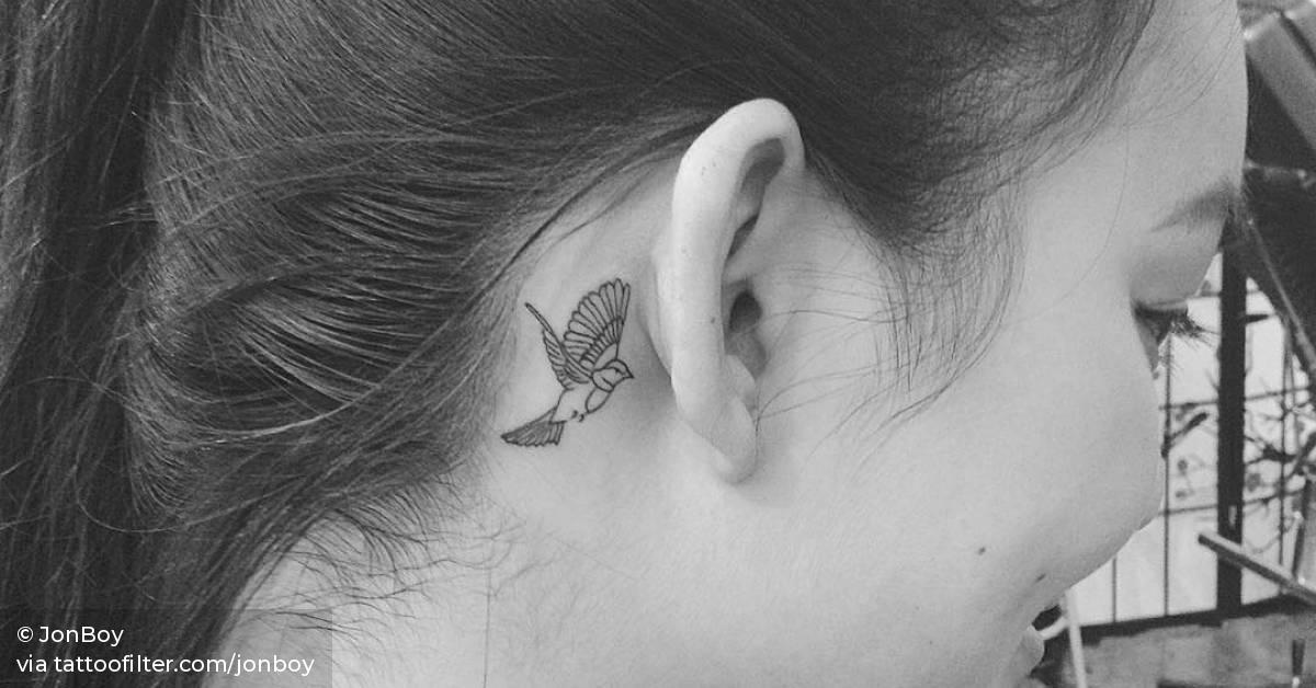 Fine line style nightingale behind the ear.