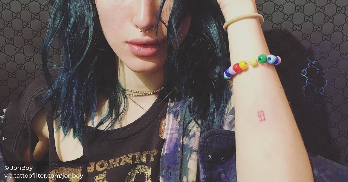 Number 93 on Bella Thorne's left forearm.