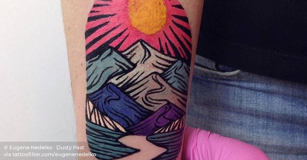 Landscape tattoo on the inner forearm.