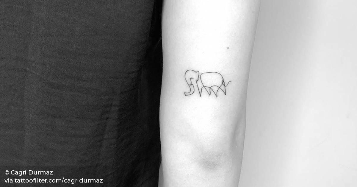 Single line elephant tattoo on the back of the right