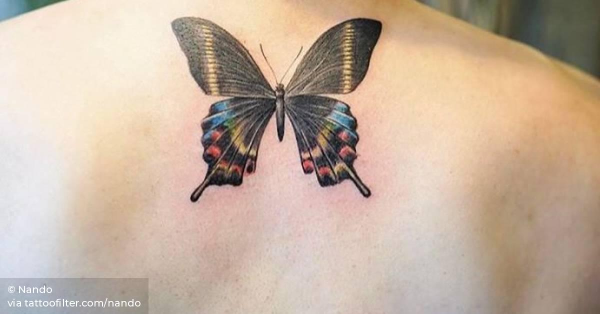 Butterfly tattoo on the upper back.