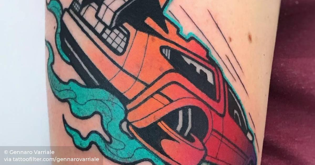 Back to the Future DeLorean tattoo on the upper arm.