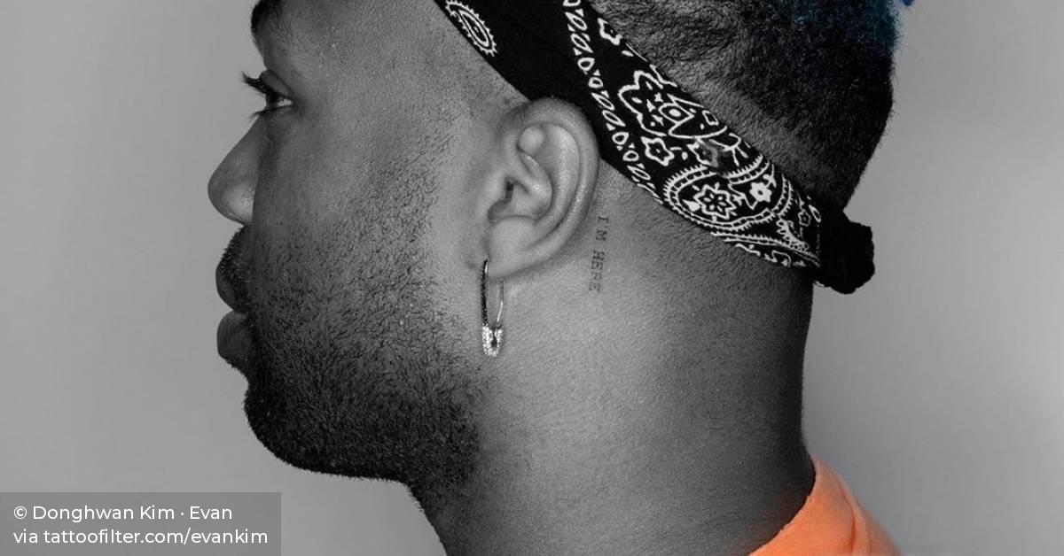 "I'm here" tattoo on Todrick Hall.