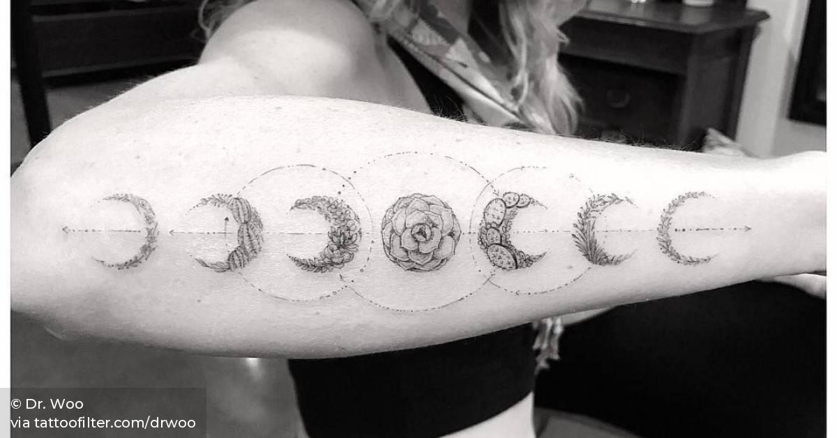 Fine line moon phases made out of plants.