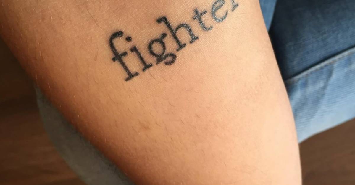 Forearm tattoo saying 'fighter' on Fabrizio.
