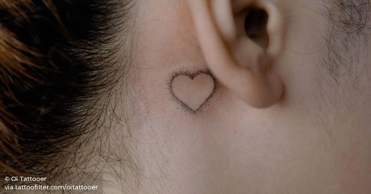 Dotwork heart on the back of the right ear.