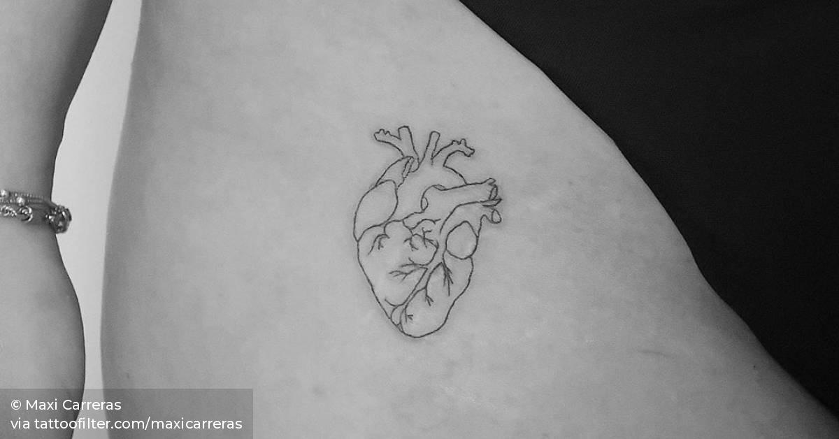 Anatomical heart tattoo.
