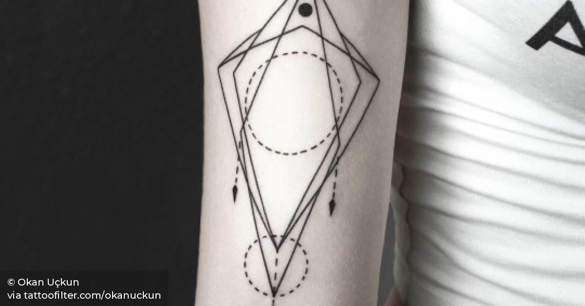 Geometric shapes tattoo on the bicep.