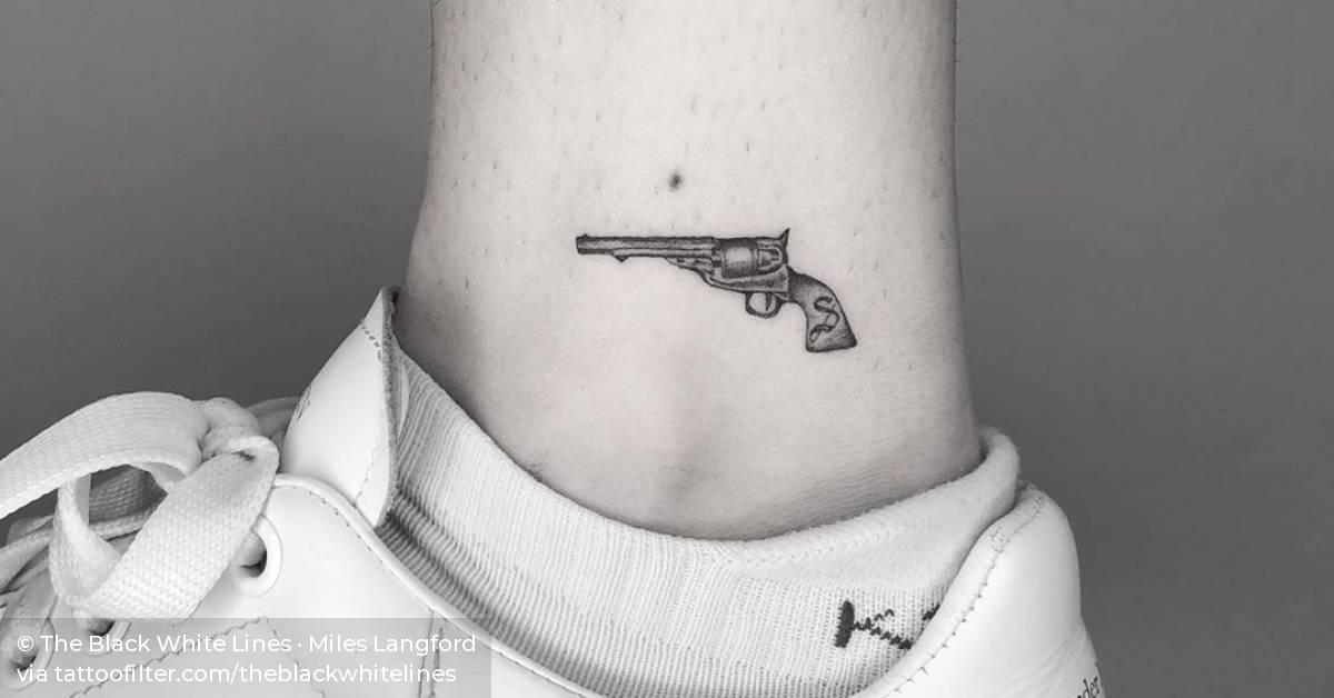 Micro gun with sisters initial in on Charlotte